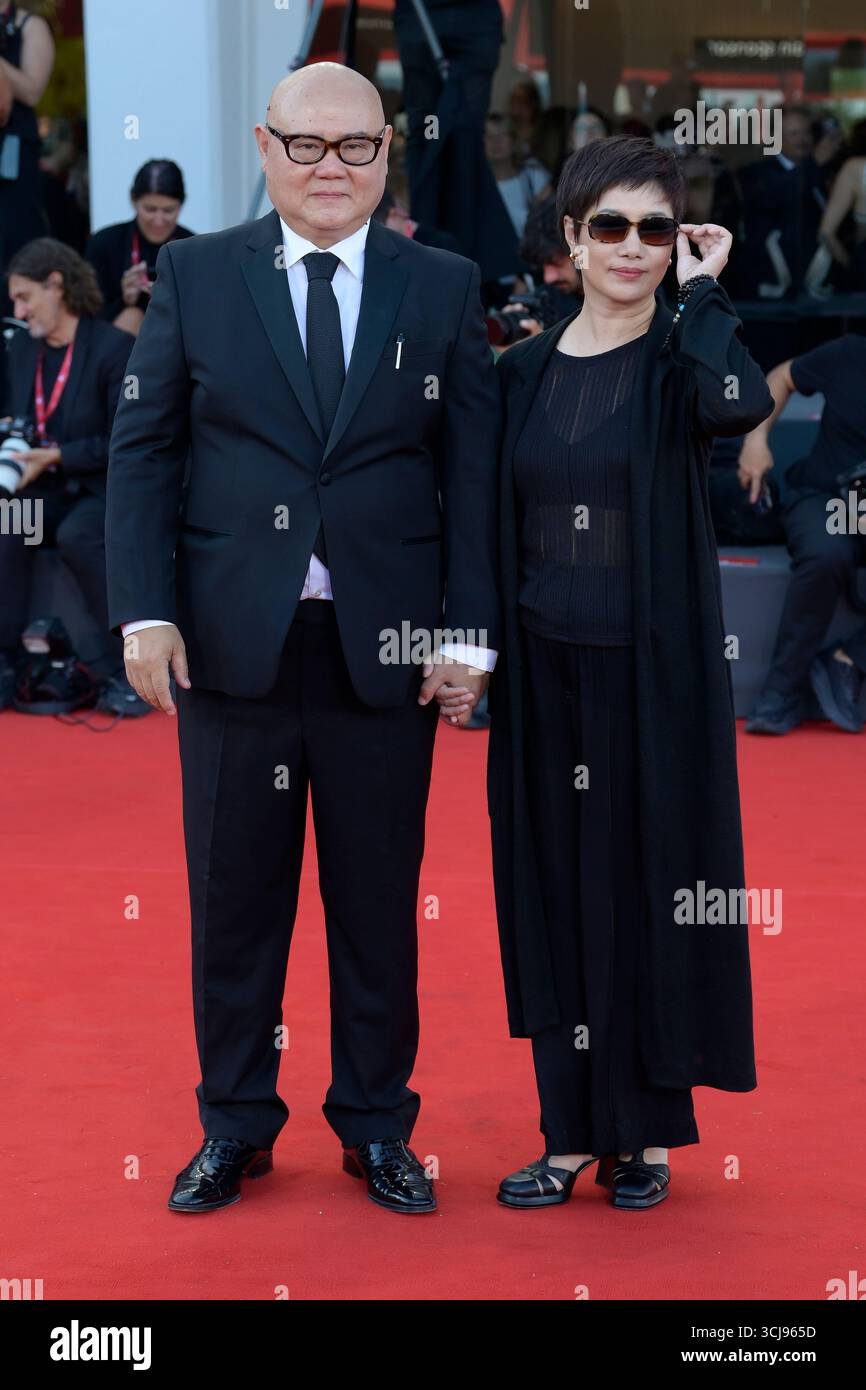 Ma Shuang and Cai Shangjun attend "The sun rises on us all" red carpet during the 82nd Venice ...