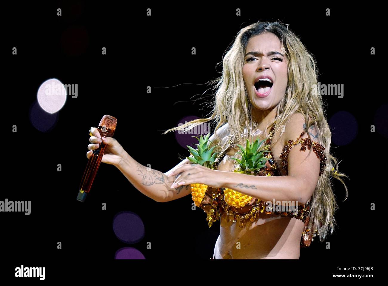 KAROL G performs during halftime at an NFL football game between the Kansas City Chiefs and the ...
