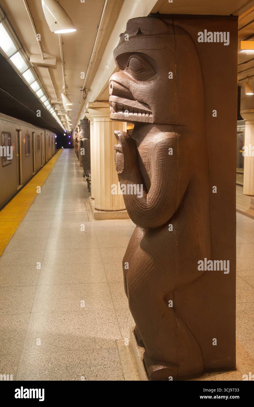 A Totem pole at Queen´s park subway station sign in Toronto, Ontario ...