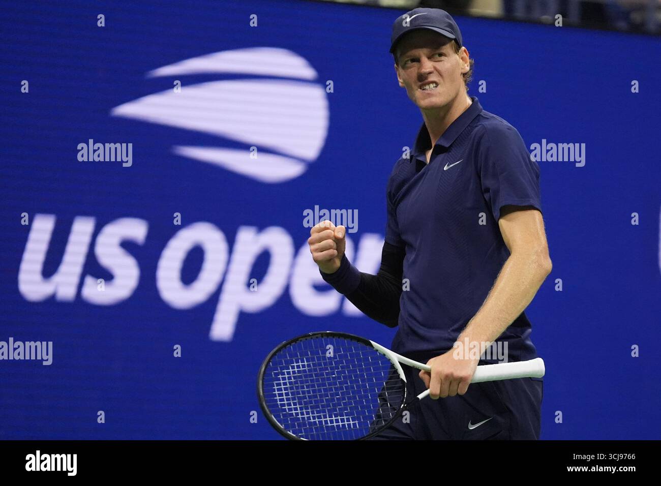 Jannik Sinner, of Italy, reacts against Felix Auger-Aliassime, of ...
