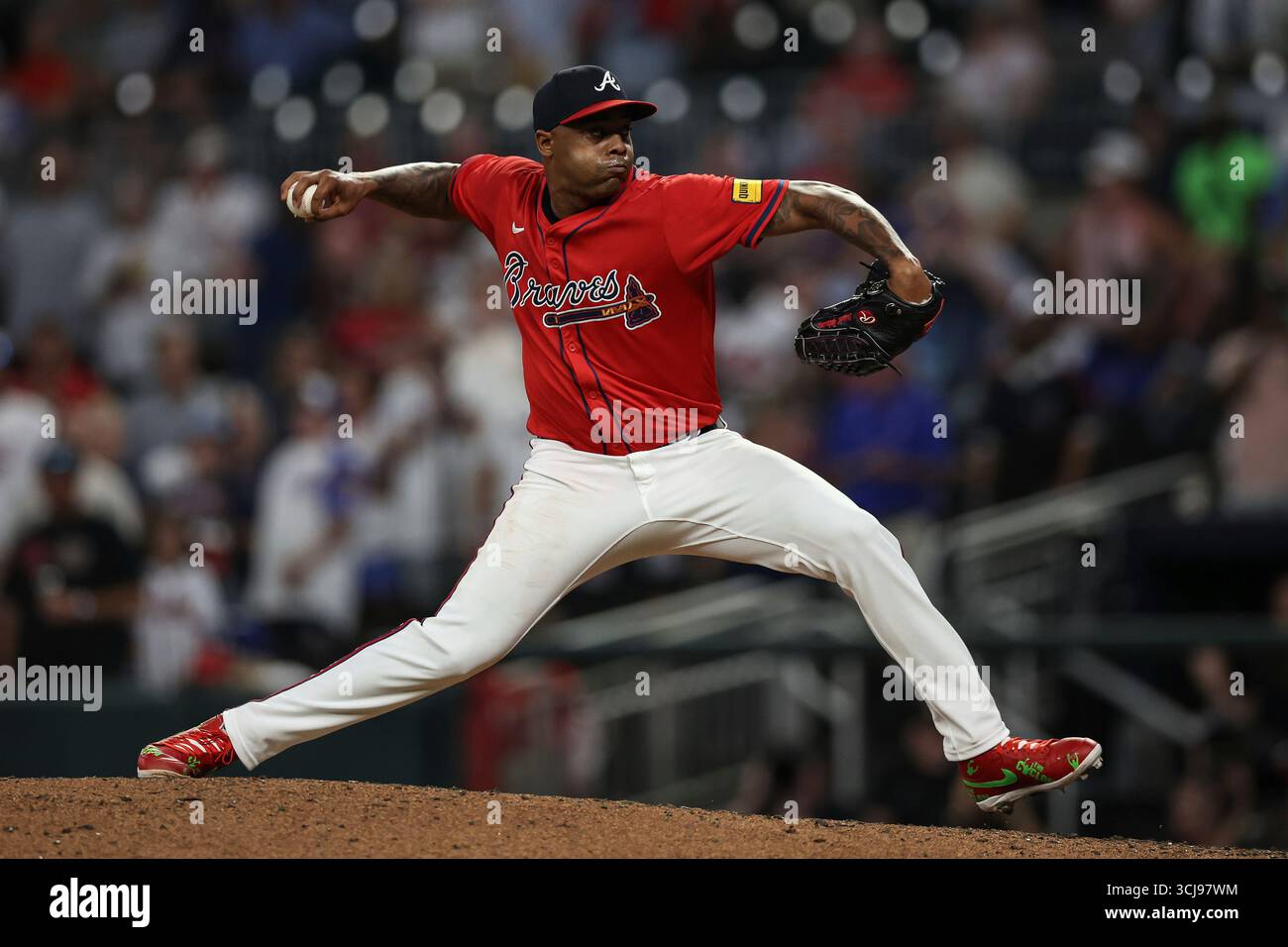 Atlanta Braves pitcher Raisel Iglesias delivers in the ninth inning of ...