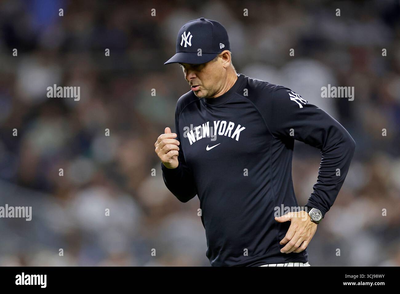 New York Yankees manager Aaron Boone (17) runs off the field during the ...