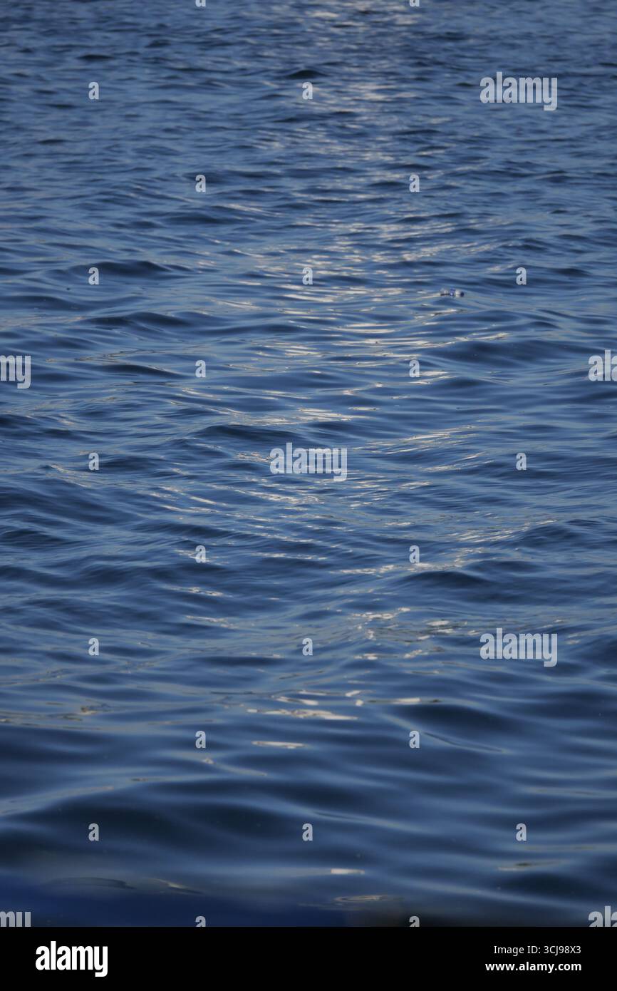 Calm water reflects sunlight hi-res stock photography and images - Alamy