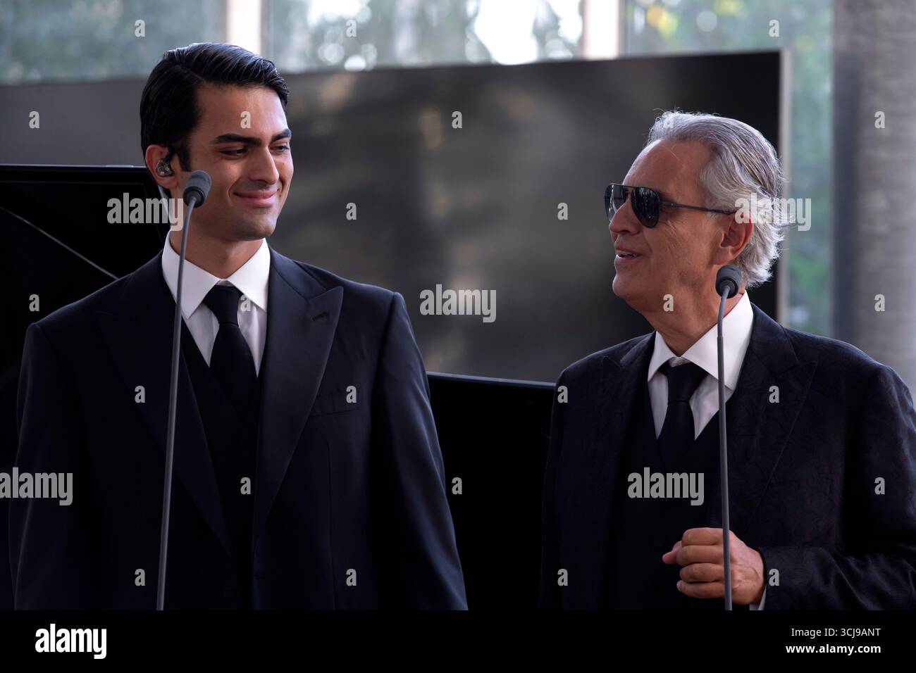 Andrea Bocelli (R) and his son Matteo Bocelli sing at the inauguration ...