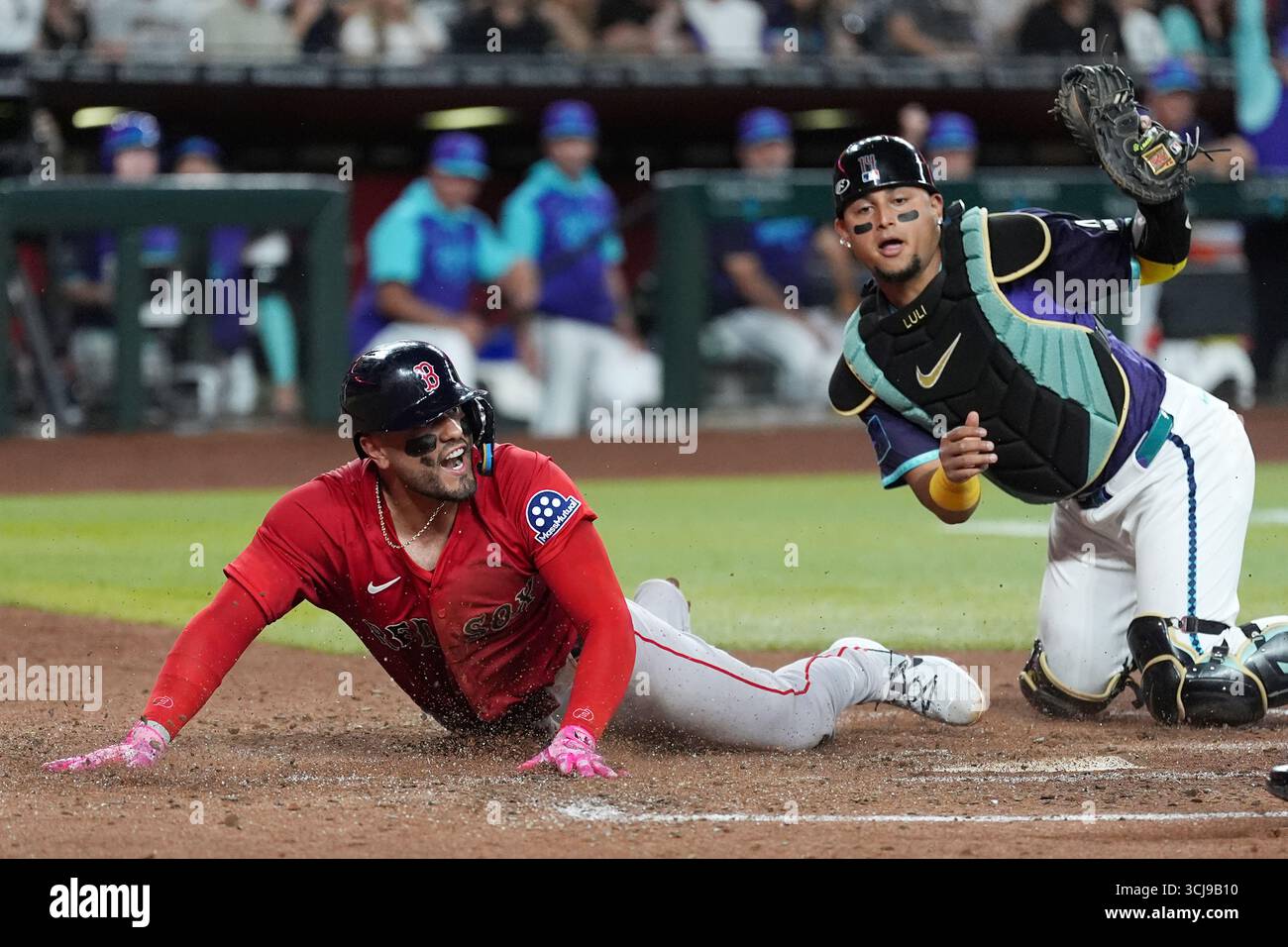 Boston Red Sox's Carlos Narváez, left, is tagged out by Arizona ...