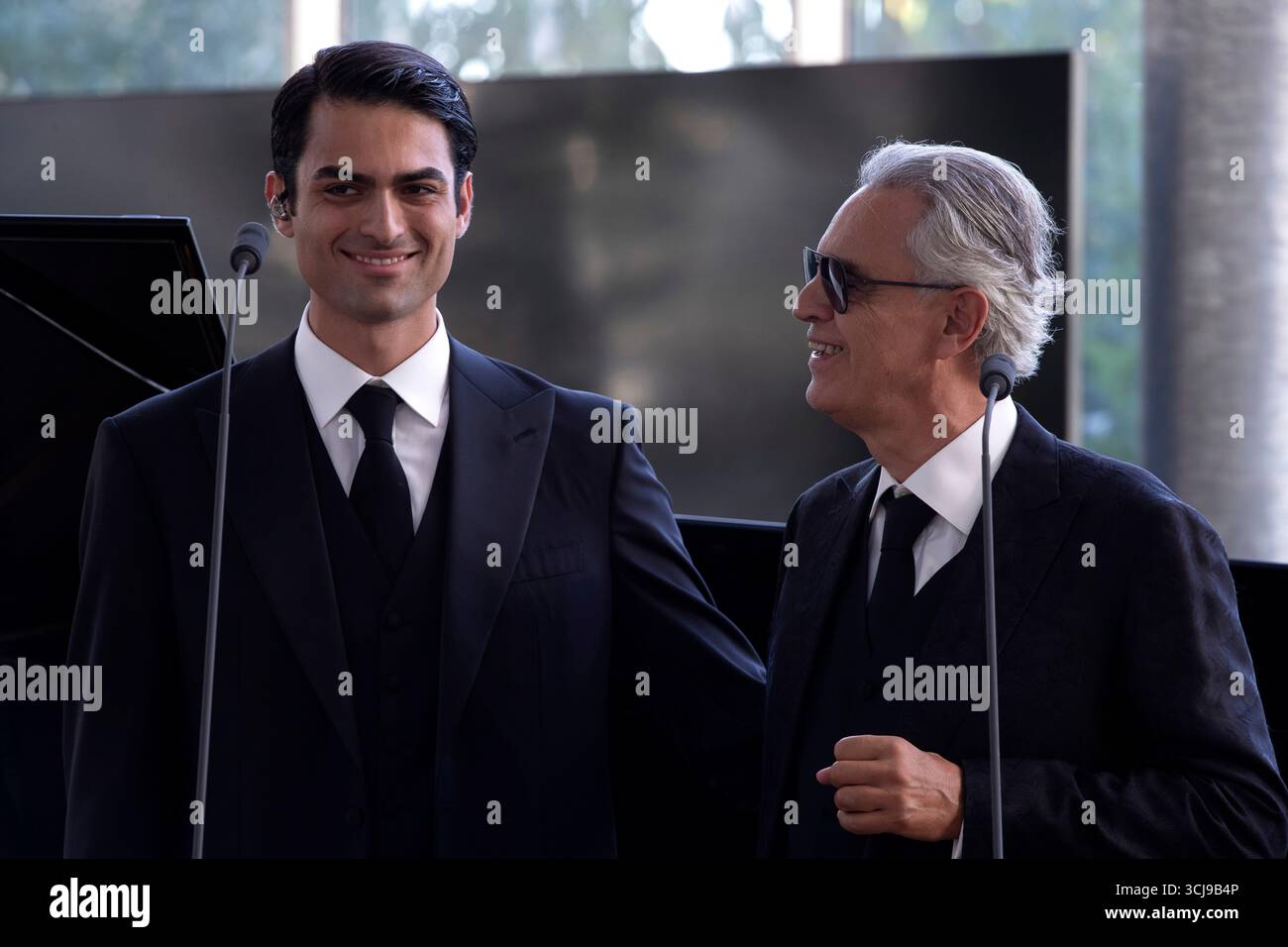 Andrea Bocelli (R) and his son Matteo Bocelli sing at the inauguration ...