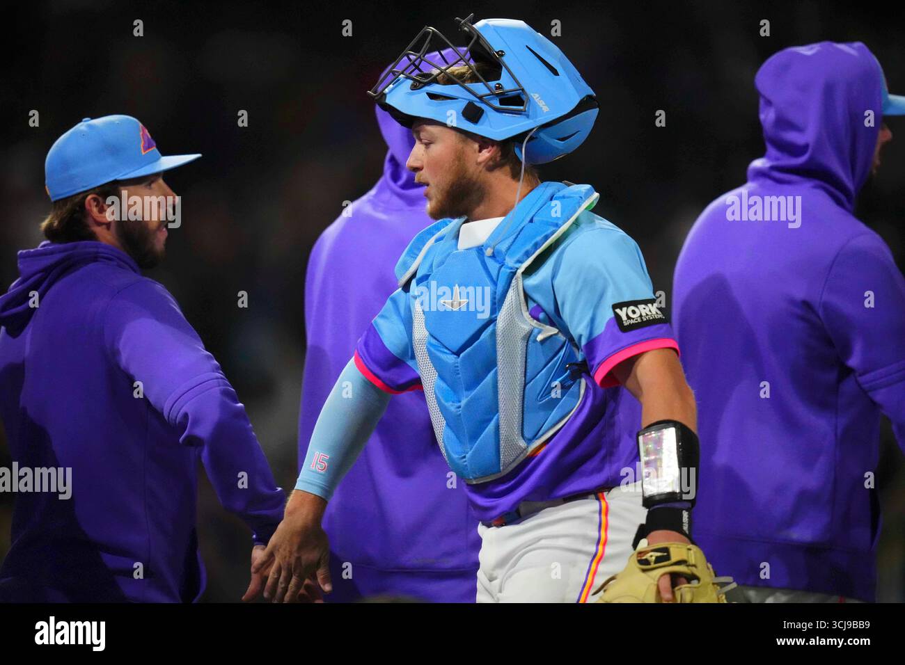 Colorado Rockies' Hunter Goodman, center, celebrates, with teammates ...