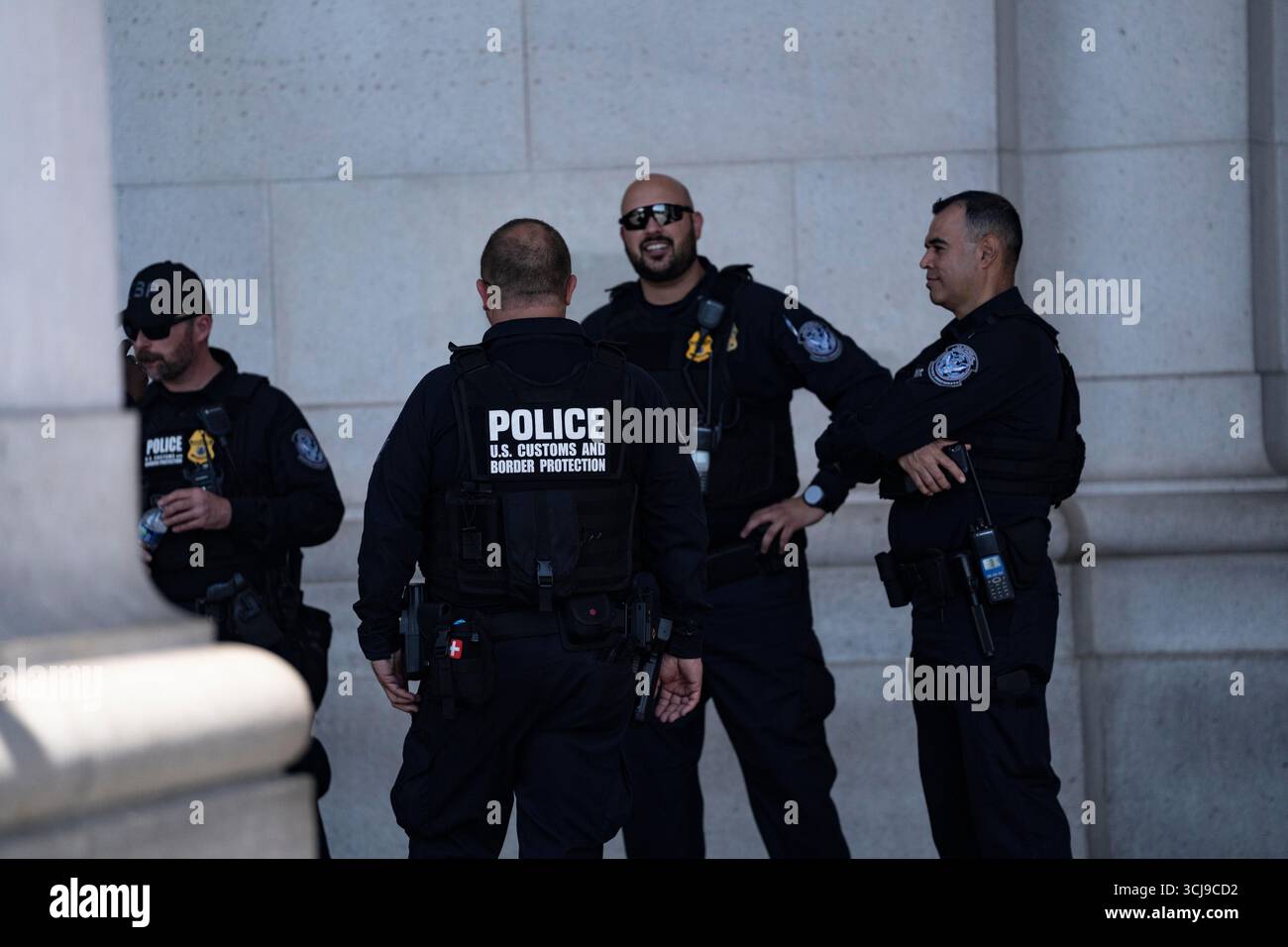 Members of the United States Customs and Border Protection Police stand ...
