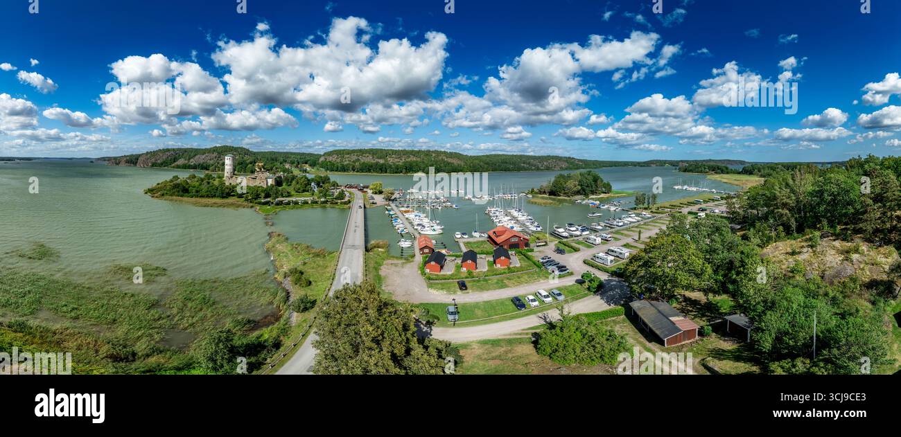 Aerial perspective of Stegeborg Castle, a Swedish ruin nestled in a bay ...