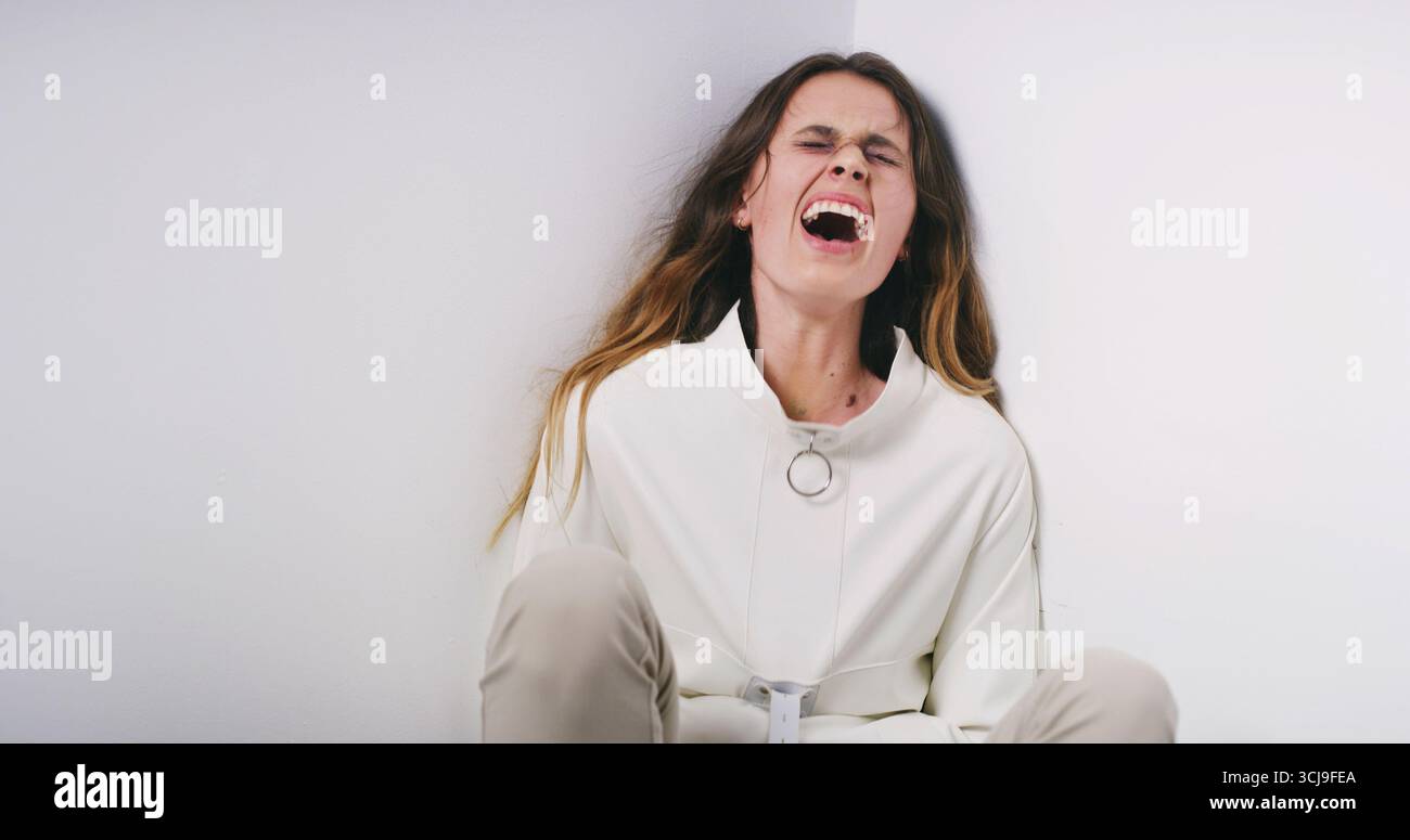 Woman, screaming and mental hospital with straitjacket for ...