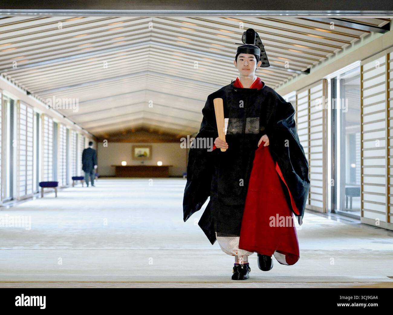 Japanese Prince Hisahito, in black-colored adult ceremonial attire, is ...