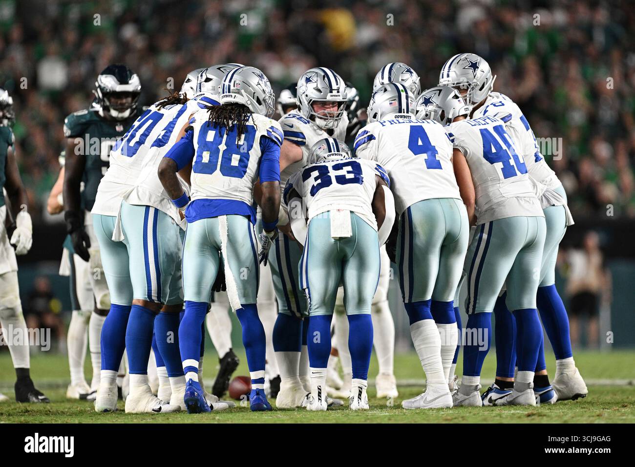 Dallas Cowboys offense huddles during the second half of an NFL ...