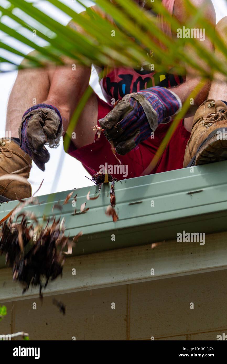 Roof edge maintenance task hi-res stock photography and images - Alamy