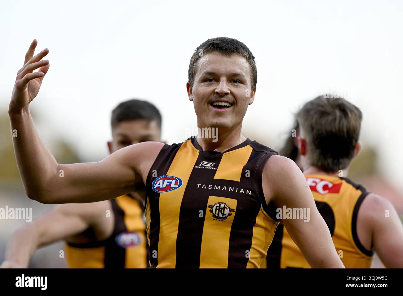 Jack Ginnivan of the Hawks celebrates after kicking a goal during the ...