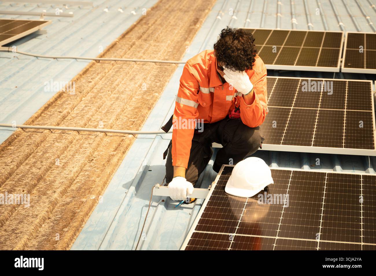 Hot tired worker Dizziness, fainting while working outdoor roof ...