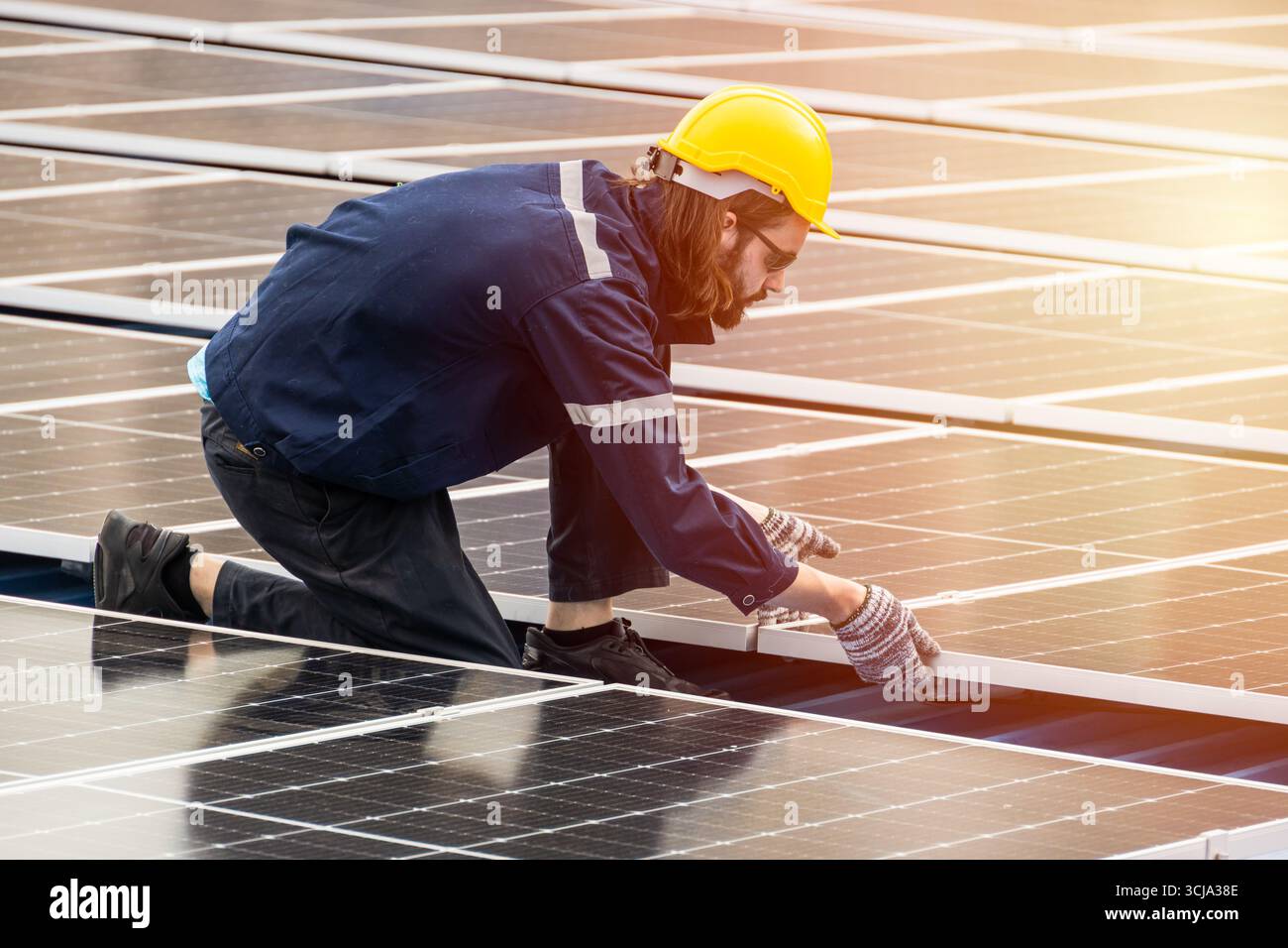Smart solar panels factory worker hi-res stock photography and images ...