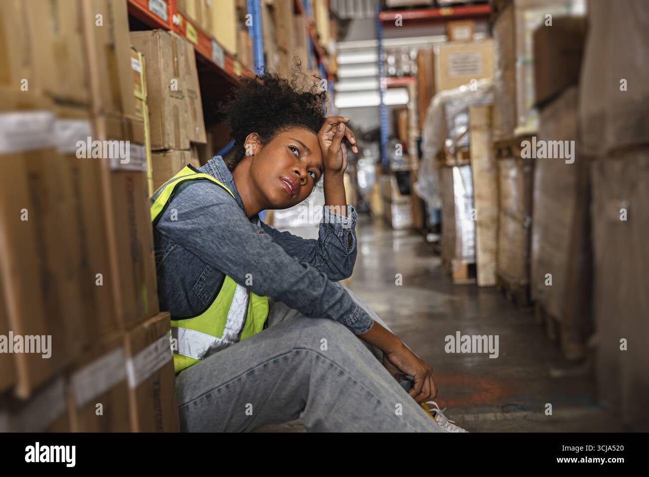 Tired stress young teen women worker labor rest in factory warehouse ...