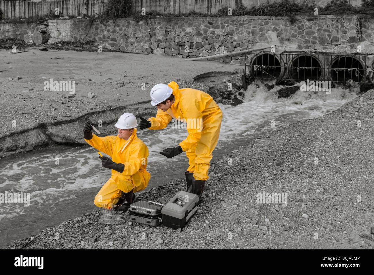 Water Pollution Control. Scientist team checking water quality from ...