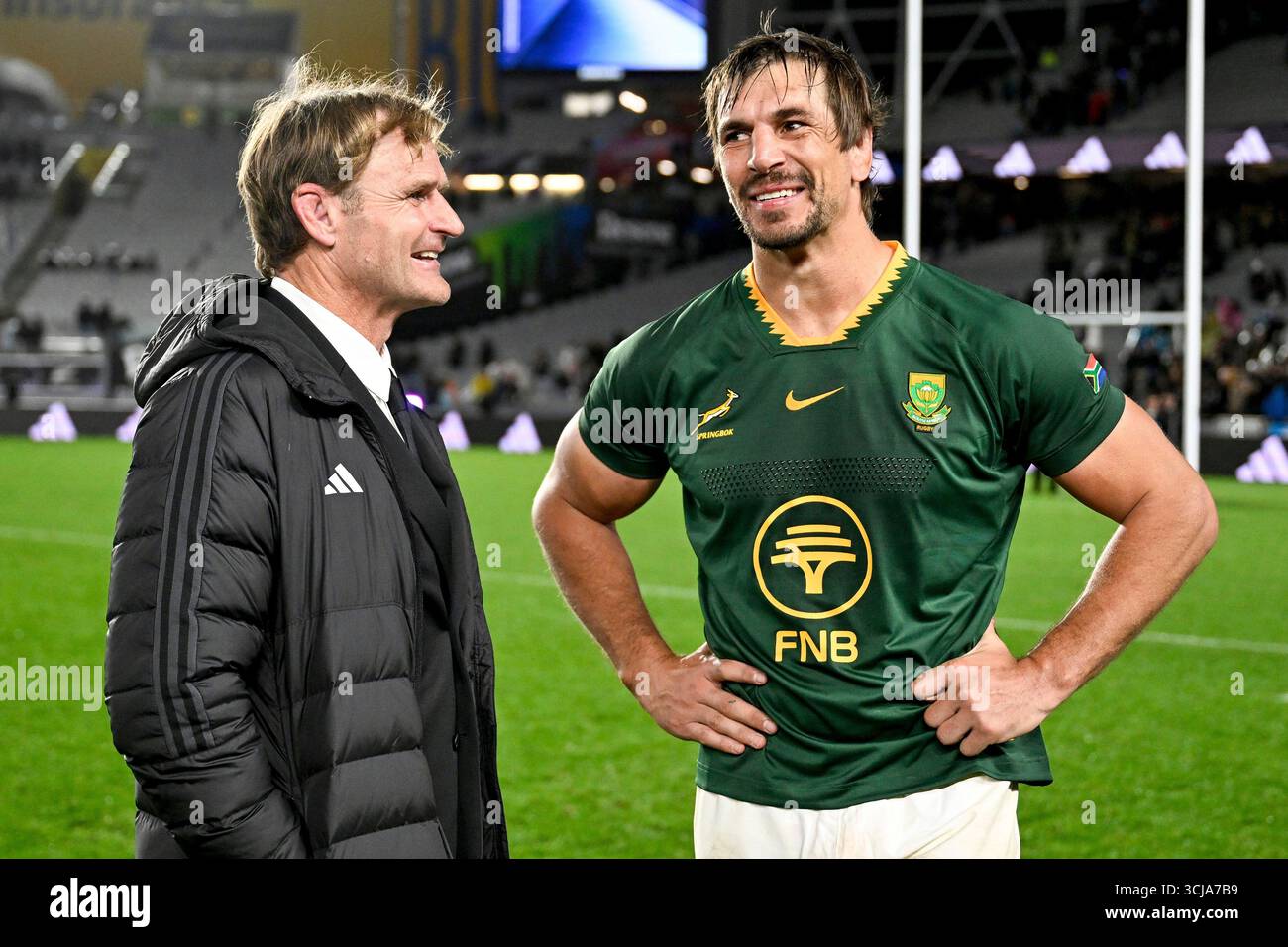 All Blacks coach Scott Robertson, left, talks with Eben Etzebeth of ...