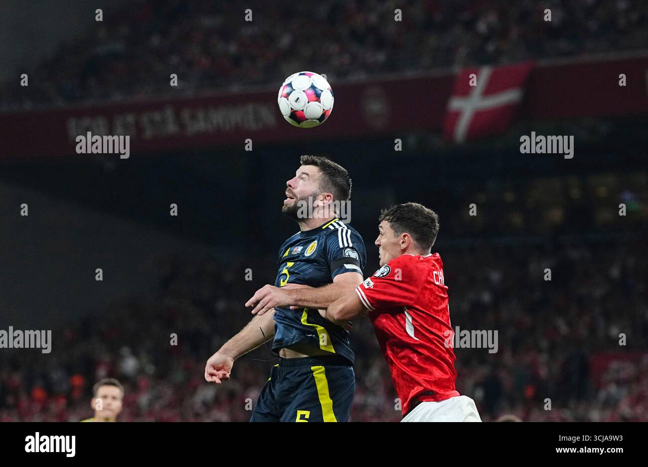 September 05 2025: Grant Hanley of Scotland and Andreas Christensen of ...