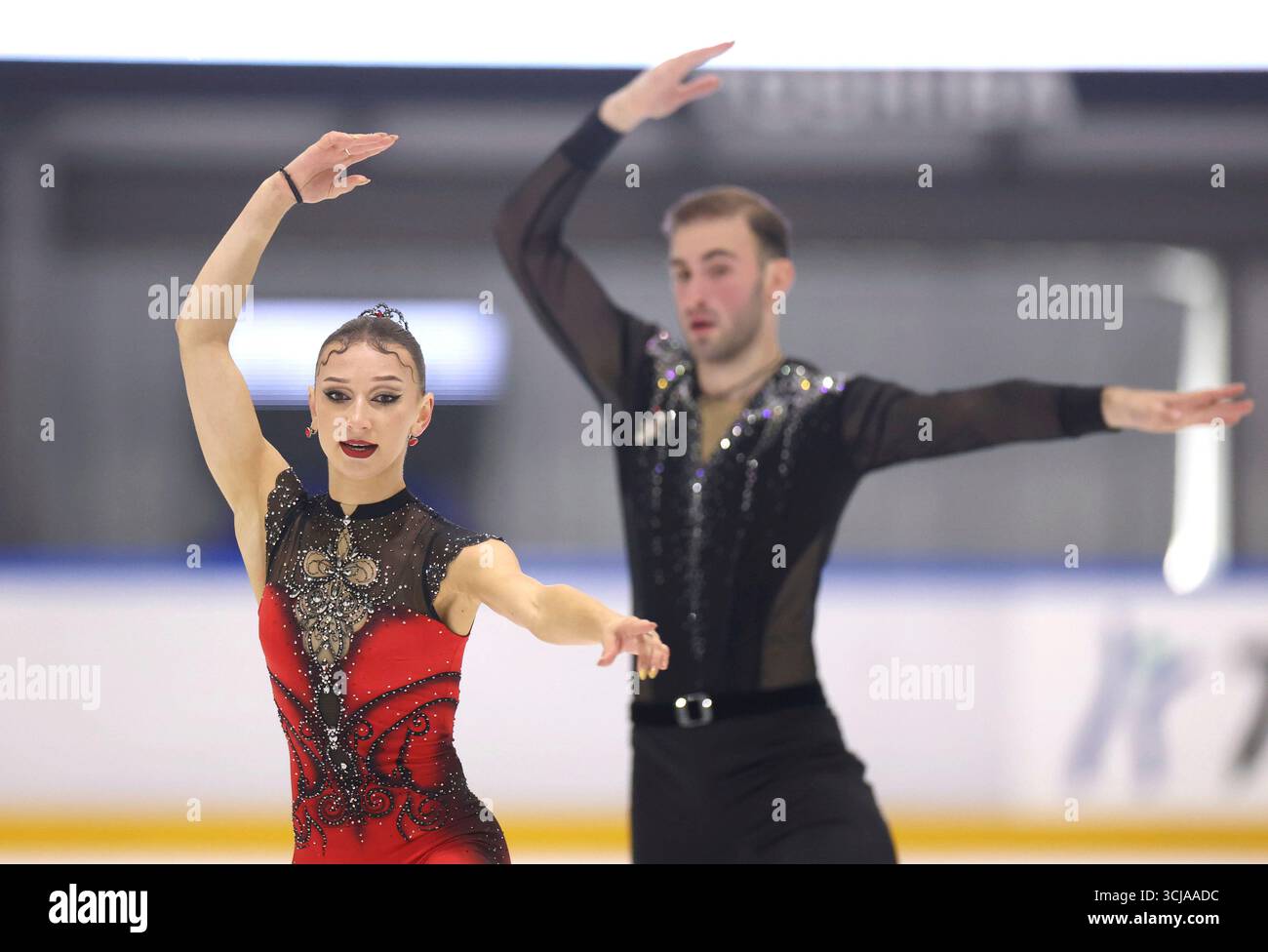 Anastasiia METELKINA and Luka BERULAVA of Georgia perform during the ...