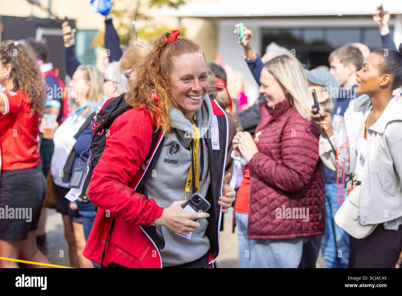 Canada's Alexandra Tessier thanks fans as she arrives off coach Canada ...