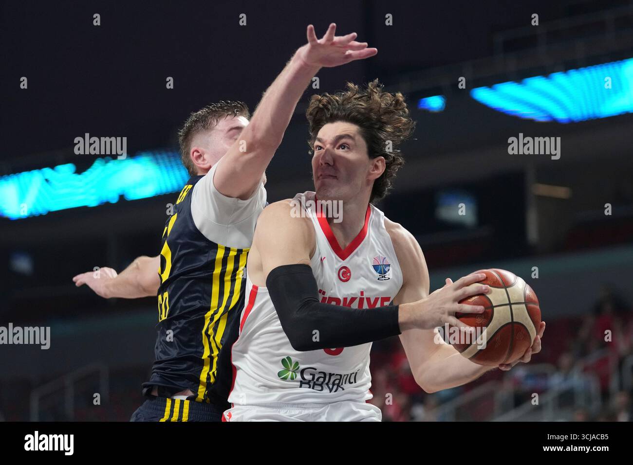 Turkey's Cedi Osman tries to shoot while defended by Sweden's Simon Birgander during the ...