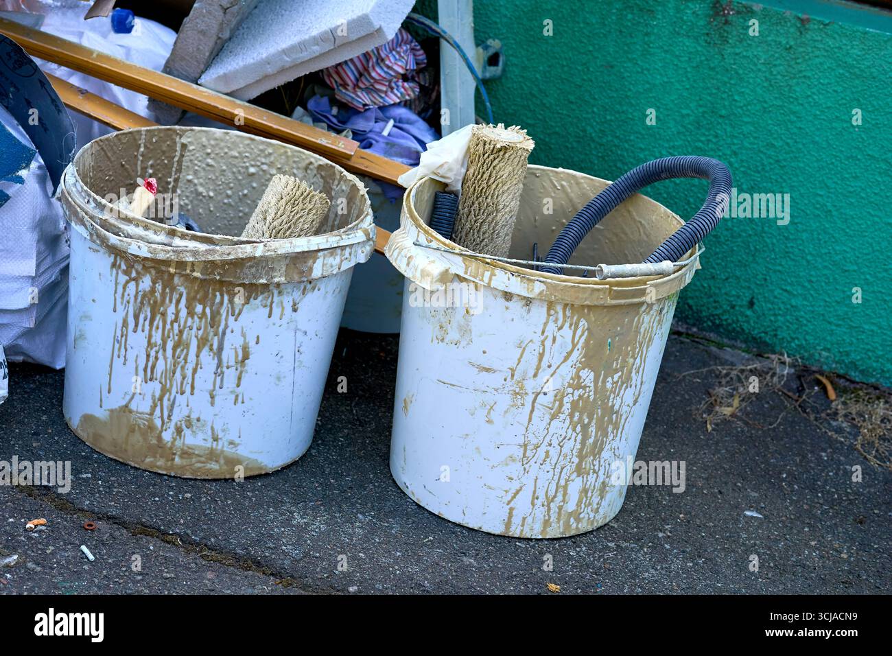 Cleaning.Construction waste,two plastic buckets with used rollers Stock ...