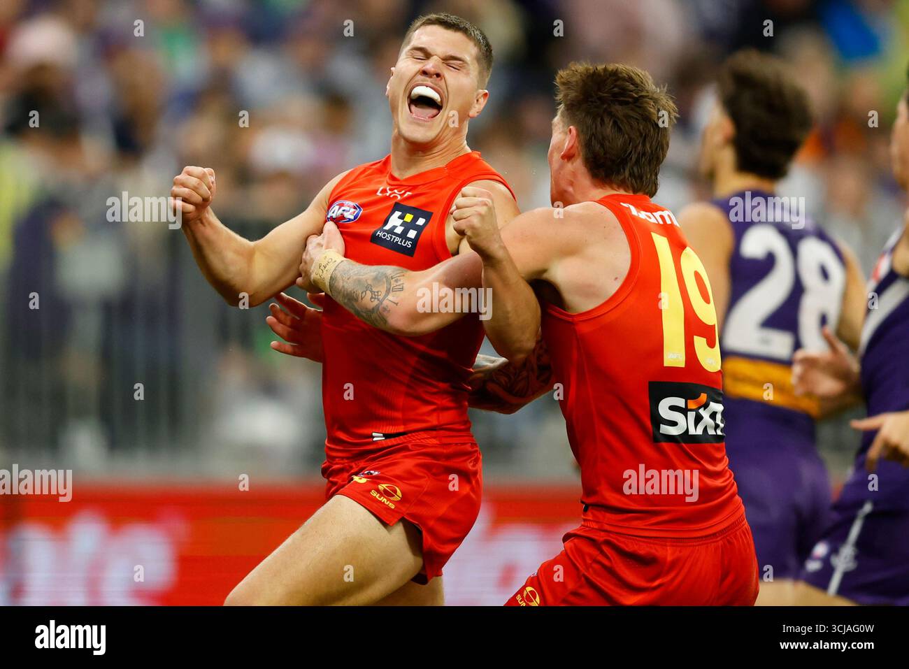 Connor Budarick of the Suns celebrates his goal during the AFL ...