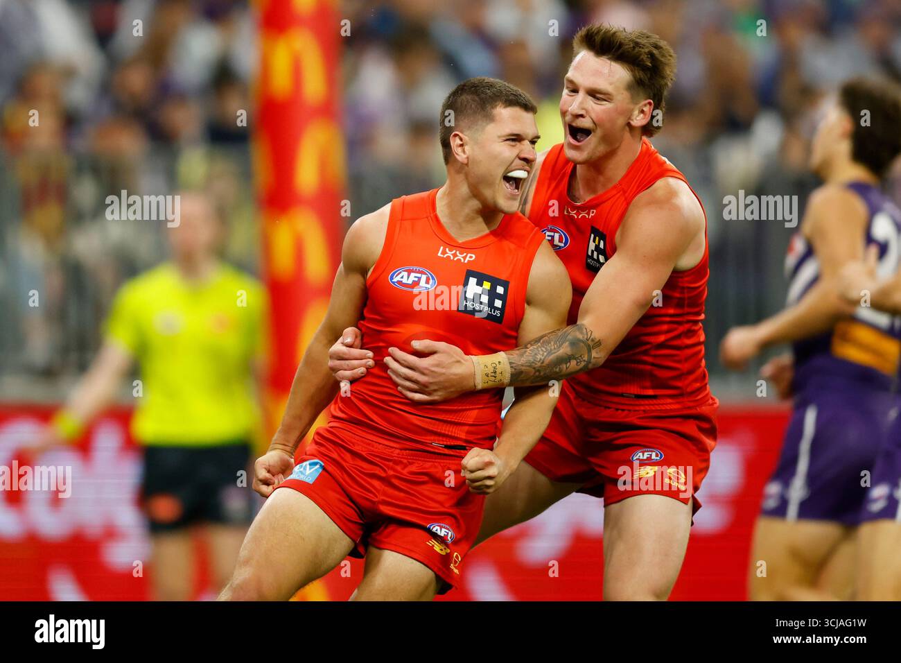 Connor Budarick of the Suns celebrates his goal during the AFL ...