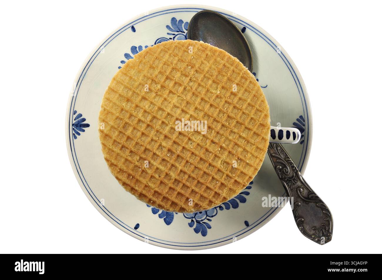 traditional Dutch stroopwafel (syrup waffle) placed on original ...