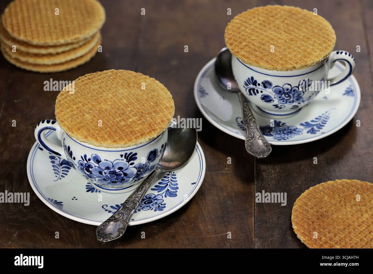 traditional Dutch stroopwafels (syrup waffles) placed on original ...