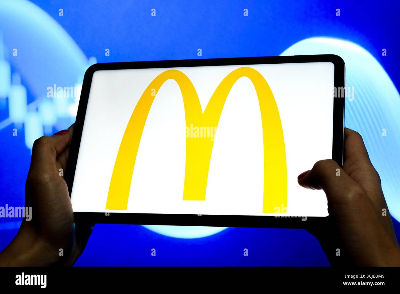 In this photo illustration, a McDonald logo is seen displayed on the ...