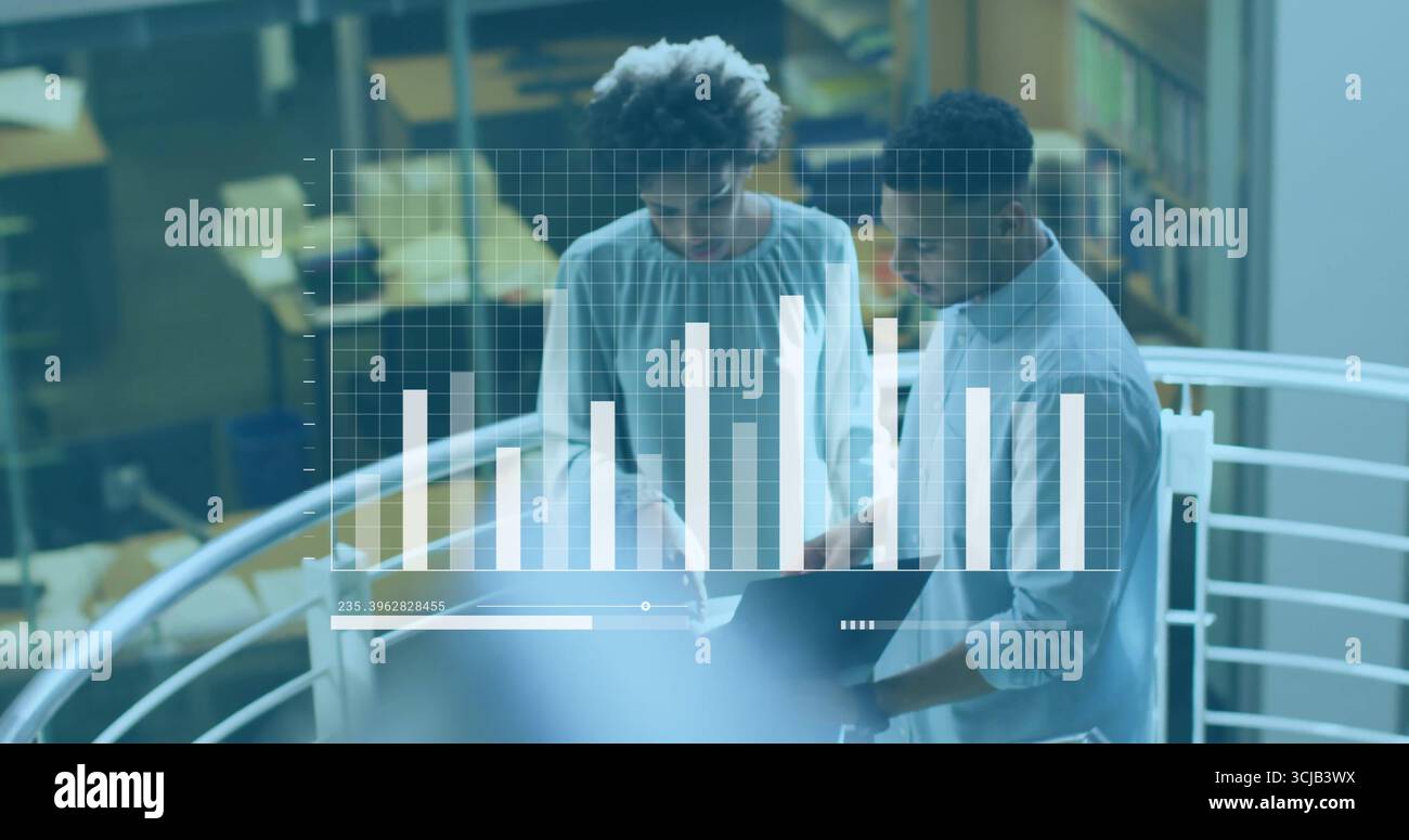 Female colleagues analyzing chart on hi-res stock photography and ...