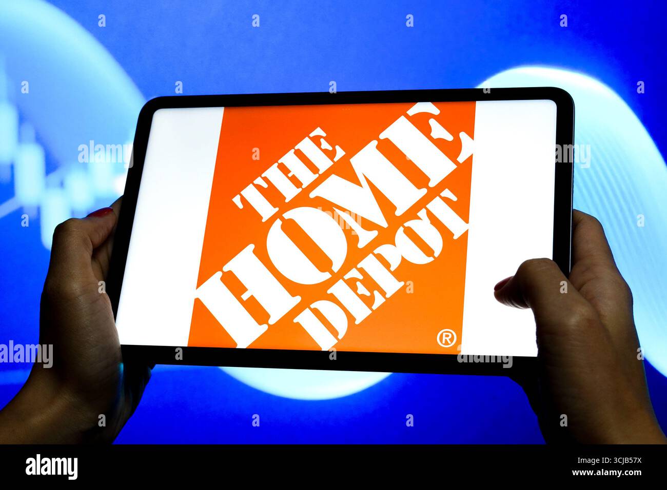 In this photo illustration, the Home Depot logo is seen displayed on ...