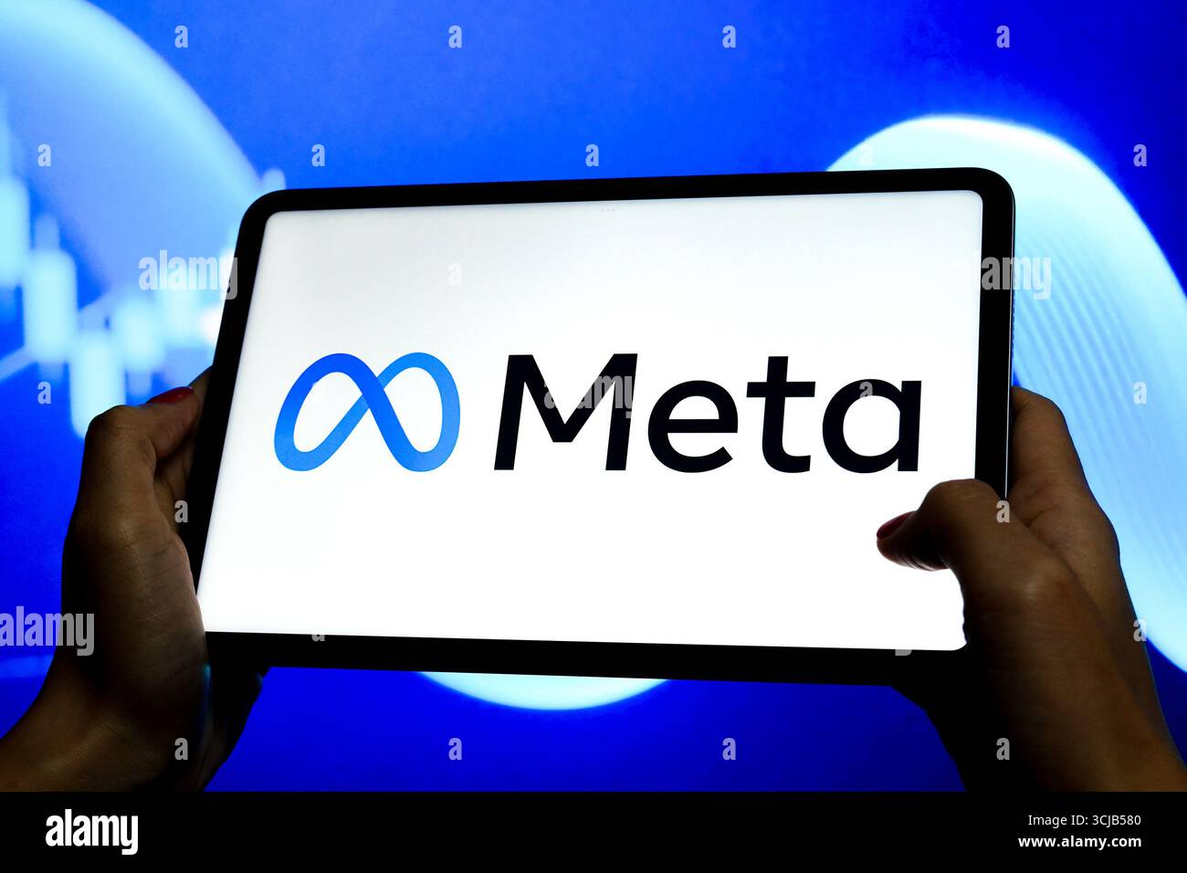 In this photo illustration, a Meta logo is seen displayed on the screen ...