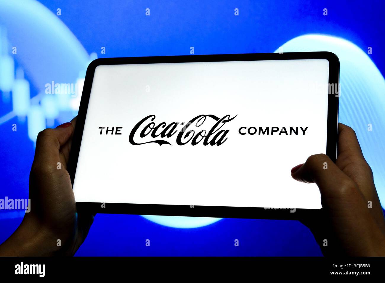 In this photo illustration, a Coca - Cola logo is seen displayed on the ...