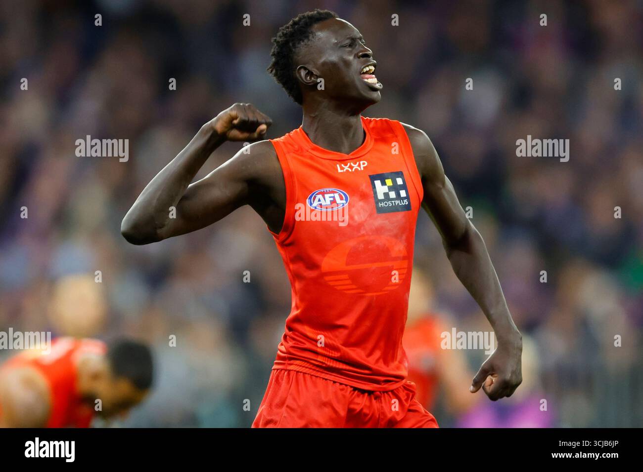 Mac Andrew of the Suns celebrates his goal during the AFL Elimination ...