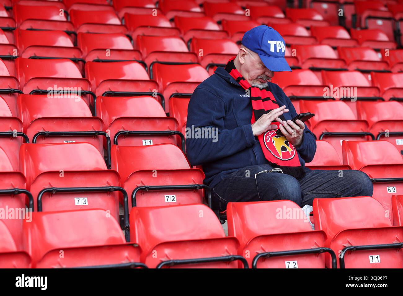 A Walsall fan before the Sky Bet League Two match at Pallet-Track ...