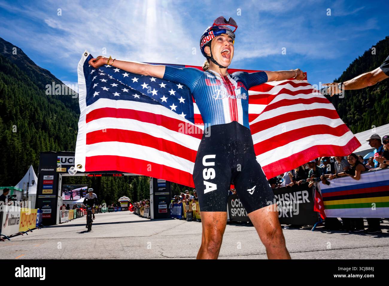 First placed Kate Courtney of the USA, celebrates winning the Women's ...
