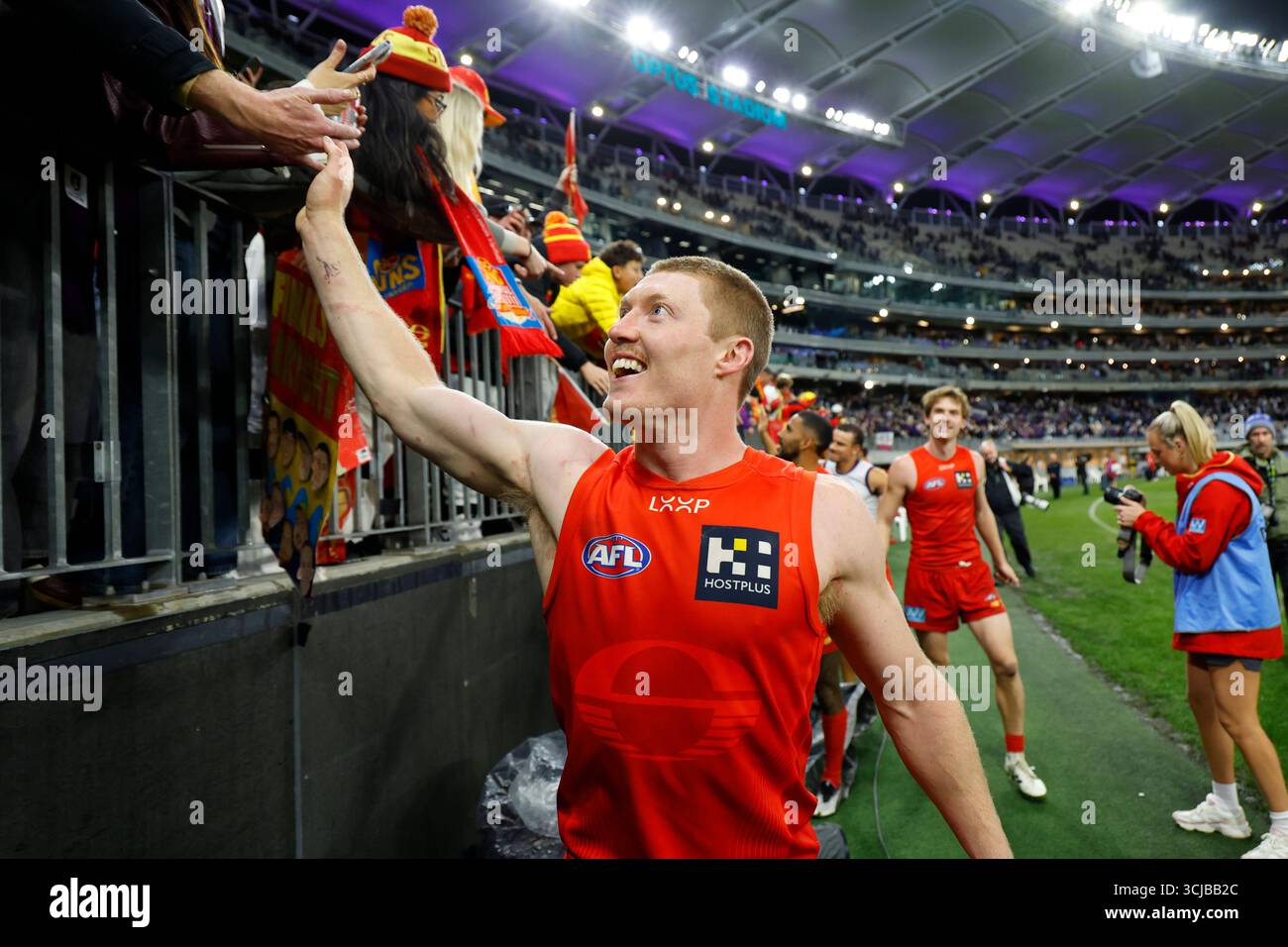 Matt Rowell of the Suns celebrates with the fans after the win during ...