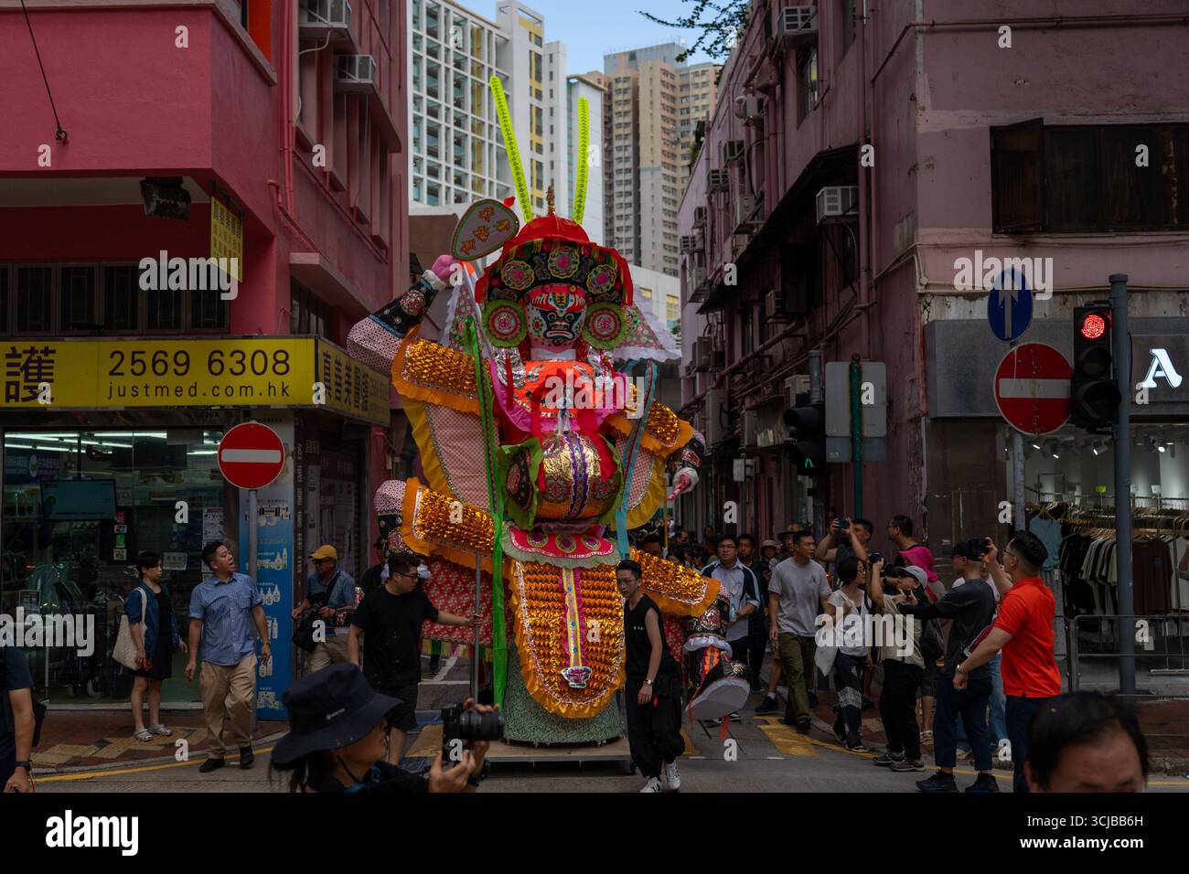 Hong Kong Daily Life People moving a ghost king at a hungry ghost ...