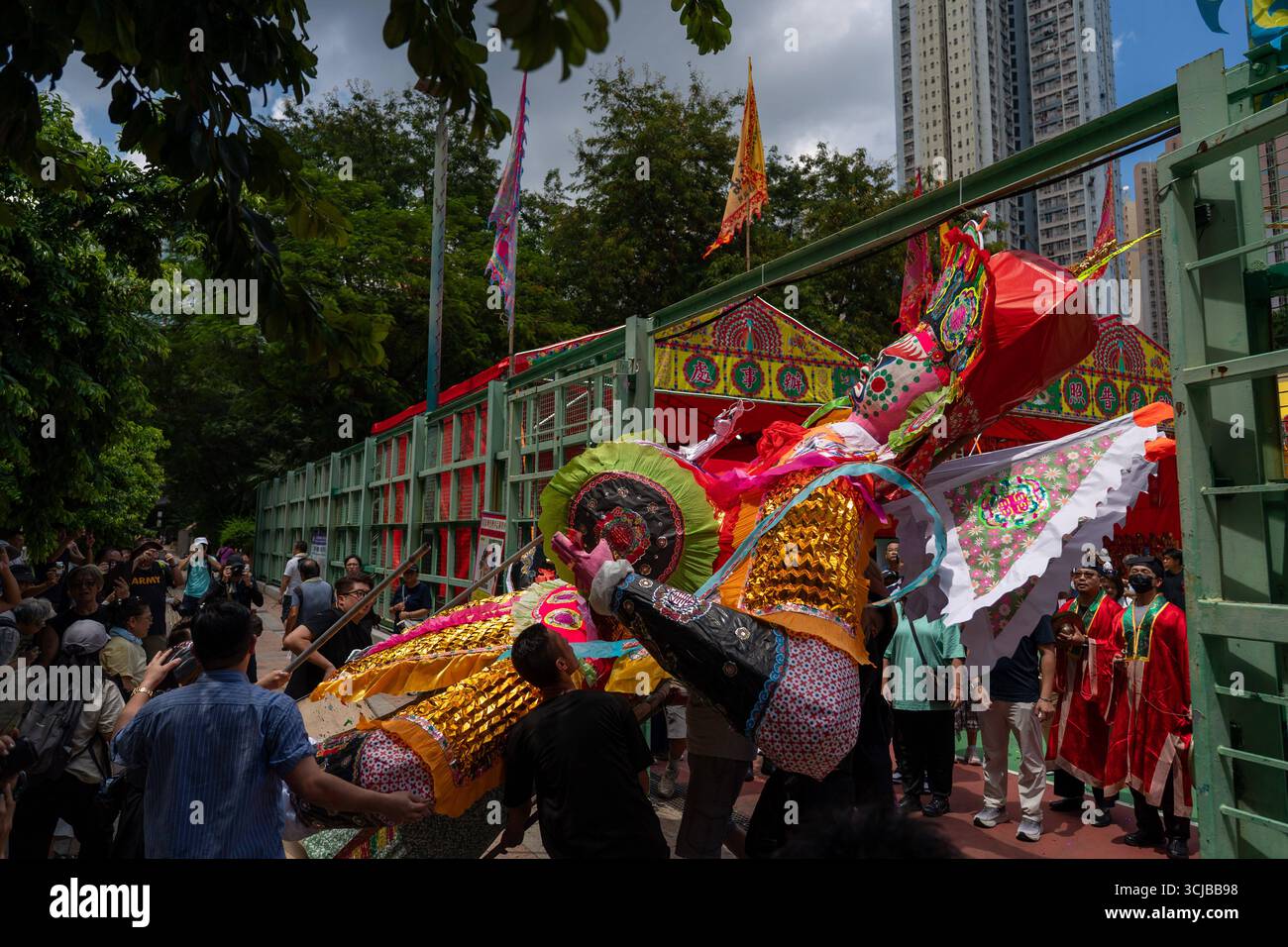 Hong Kong Daily Life People moving a ghost king at a hungry ghost ...