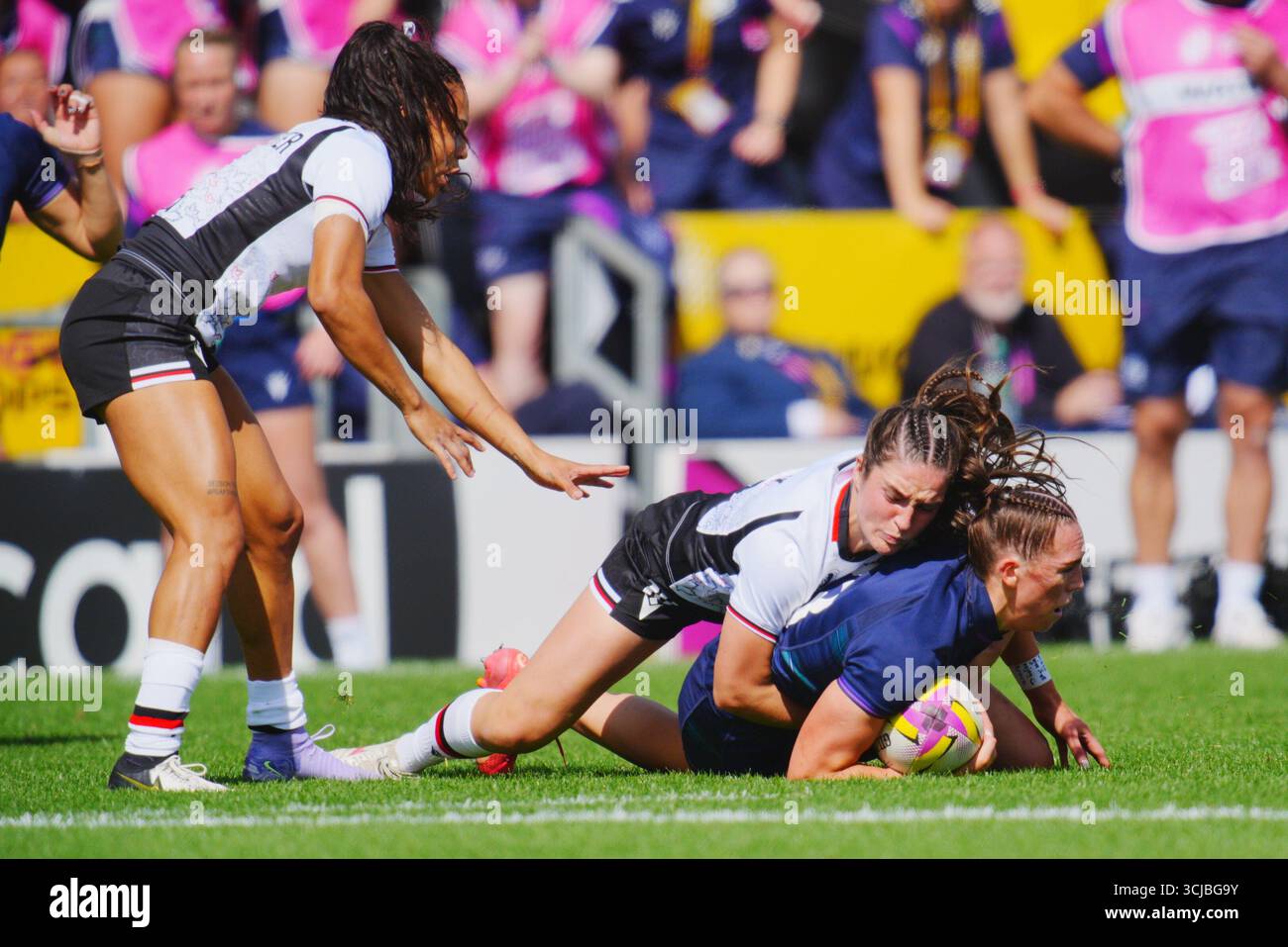 Scotland's Emma Orr (right) is tackled during the Women's Rugby World ...