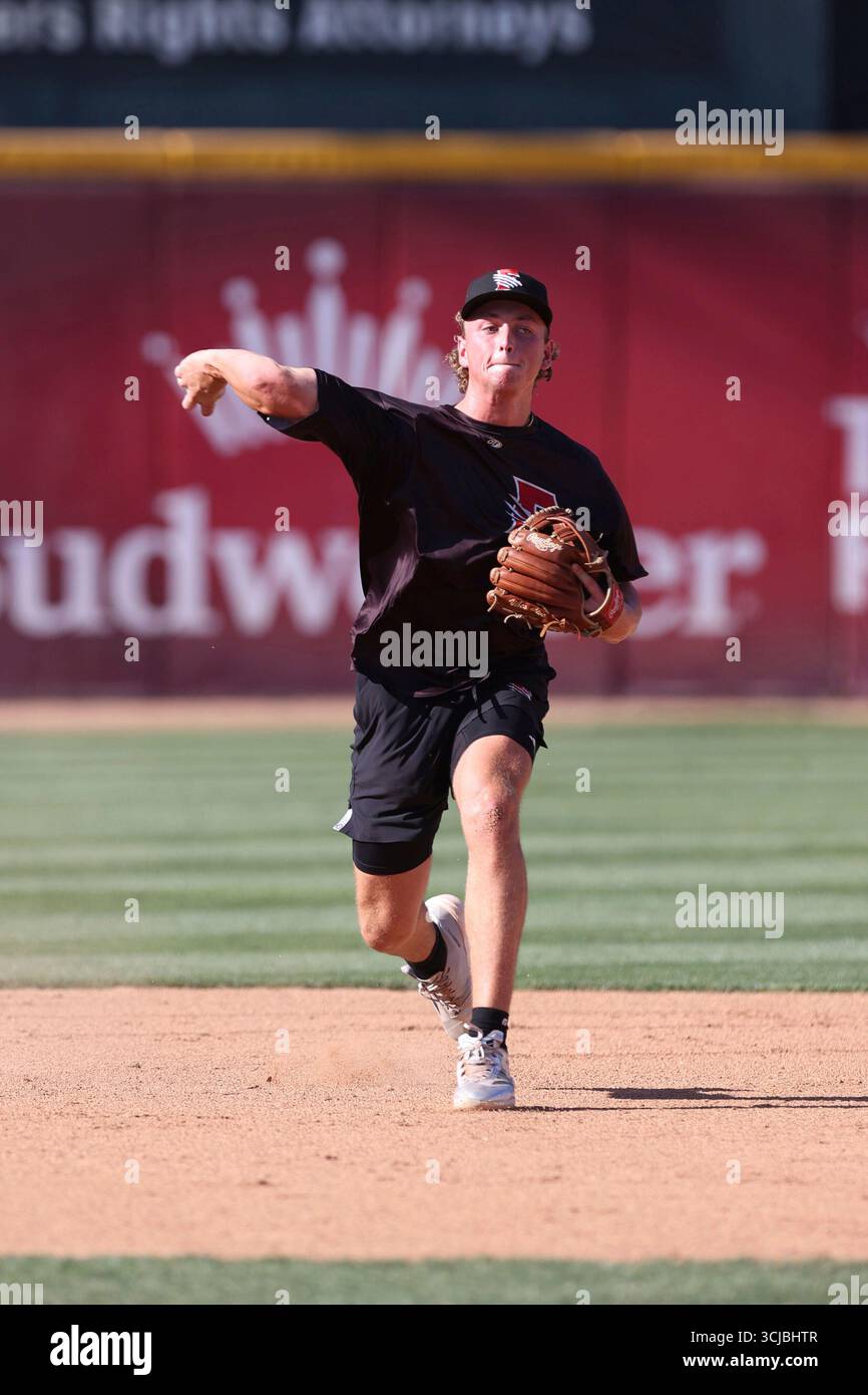 Ethan Holliday (18) of the Fresno Grizzlies takes infield practice ...