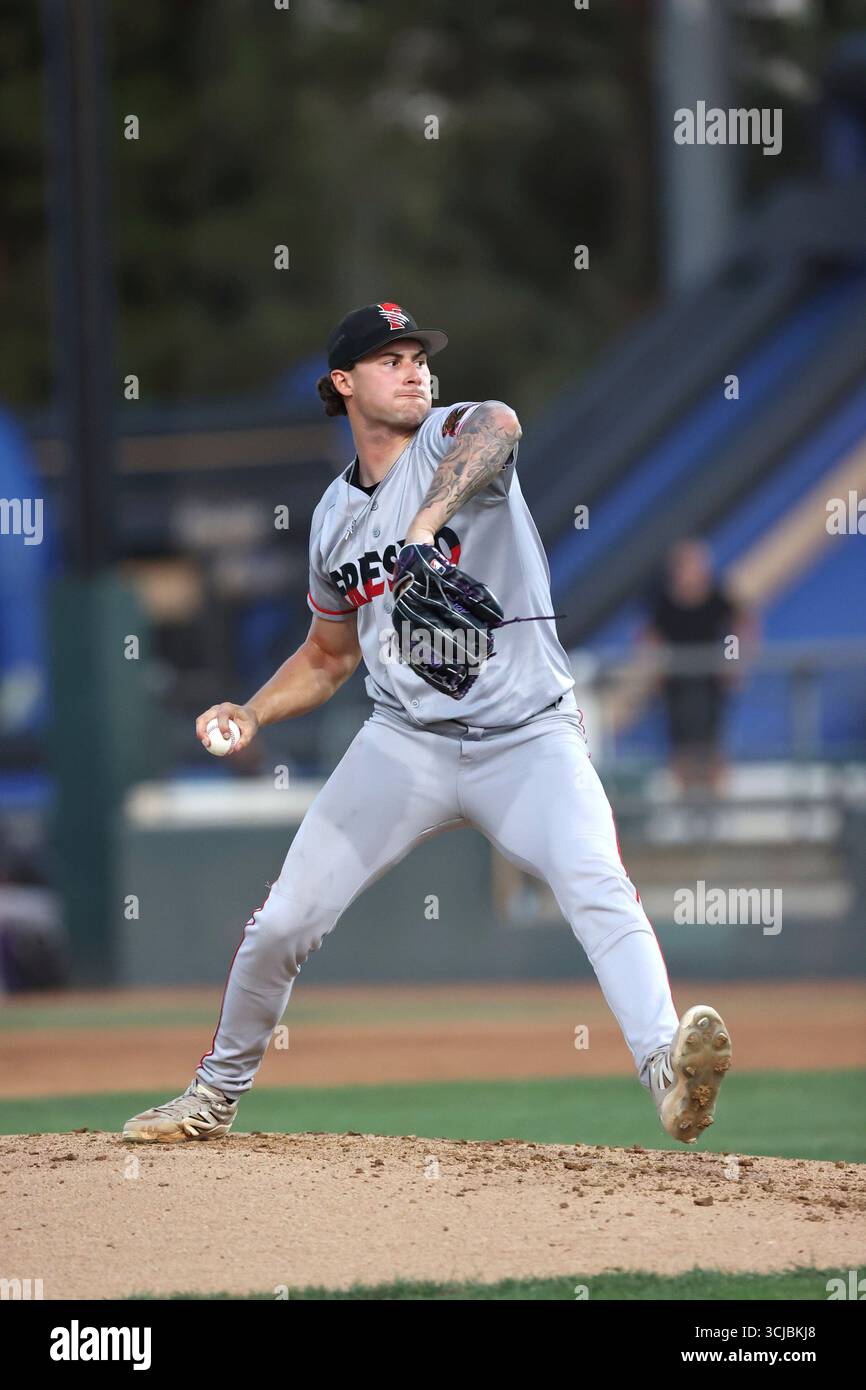 Brody Brecht (11) of the Fresno Grizzlies pitches against the Rancho ...