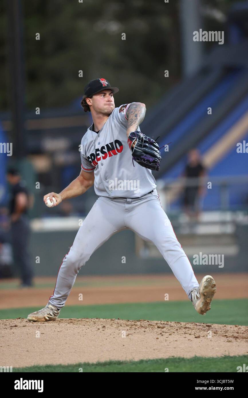 Brody Brecht (11) of the Fresno Grizzlies pitches against the Rancho ...