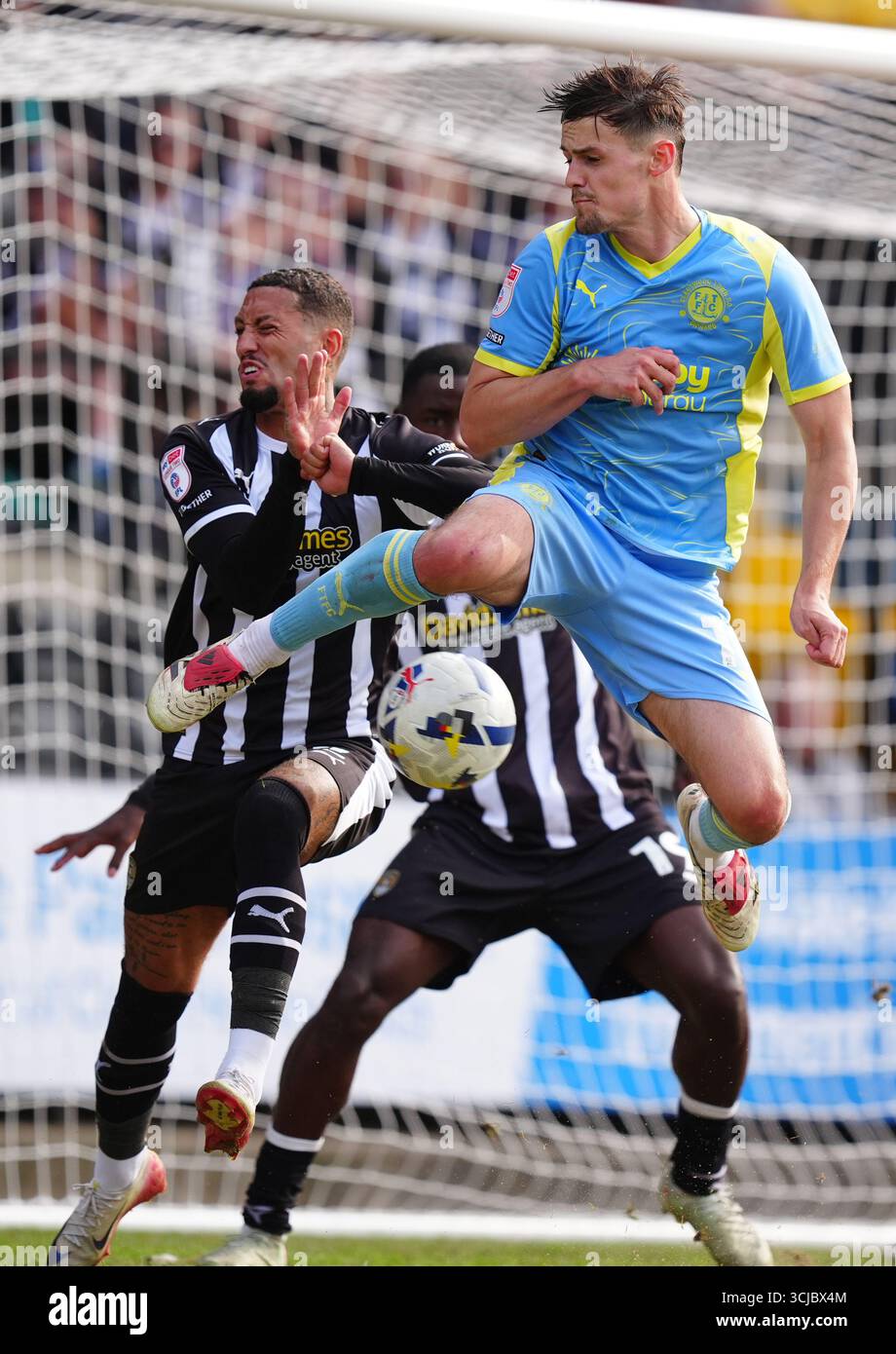 Fleetwood Town's Mark Helm (right) and Notts County's Kellan Gordon ...