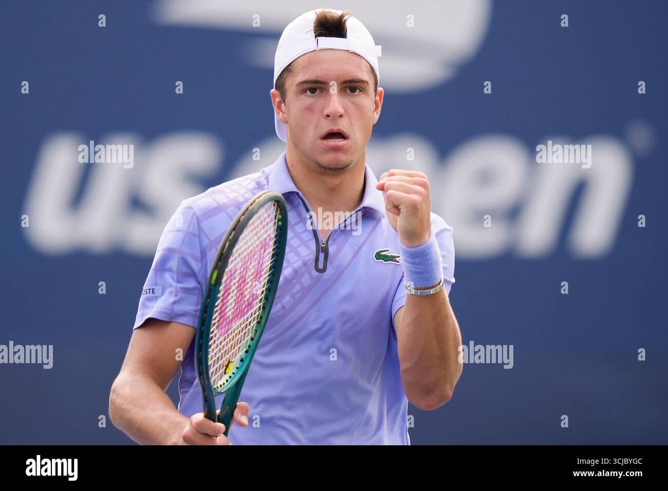 Alexander Vasilev, of Bulgaria, reacts after scoring a point against Ivan Ivanov, of Bulgaria ...