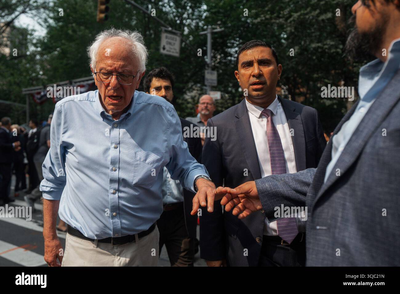 Sen. Bernie Sanders, I-Vt., leaves with members of security detail ...